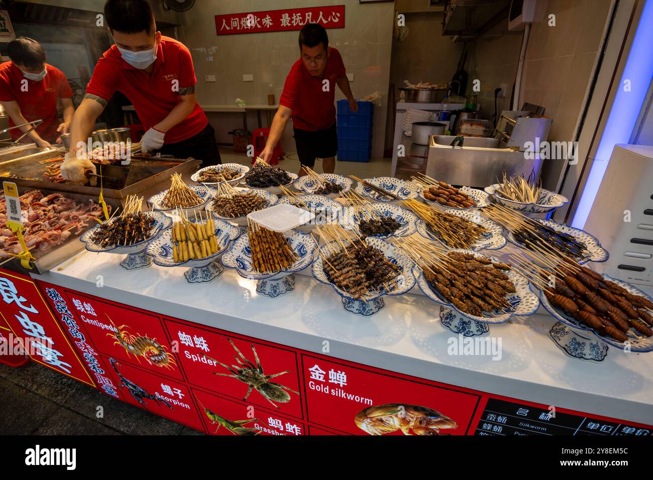 Shop selling fried insects in the famous Dongmen pedestrian street ...