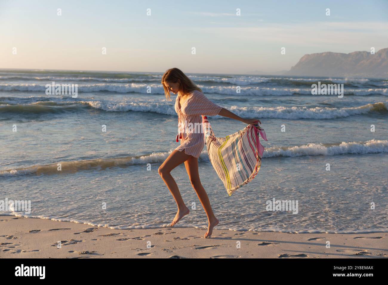 People walking enjoying beach hi-res stock photography and images - Alamy