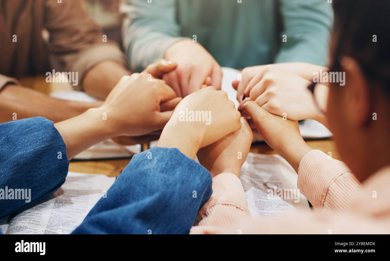 Religion, holding hands and group with faith, praying and friends with ...