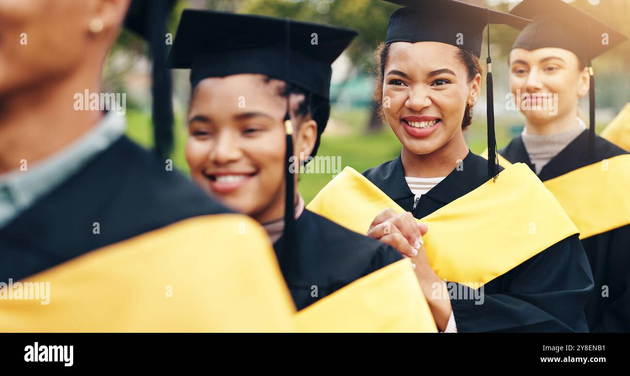 Row, graduation and people outdoor at university for achievement in ...