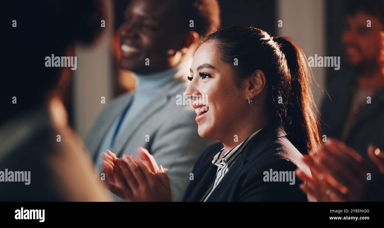 Woman, smile and applause in seminar for business, employee engagement ...