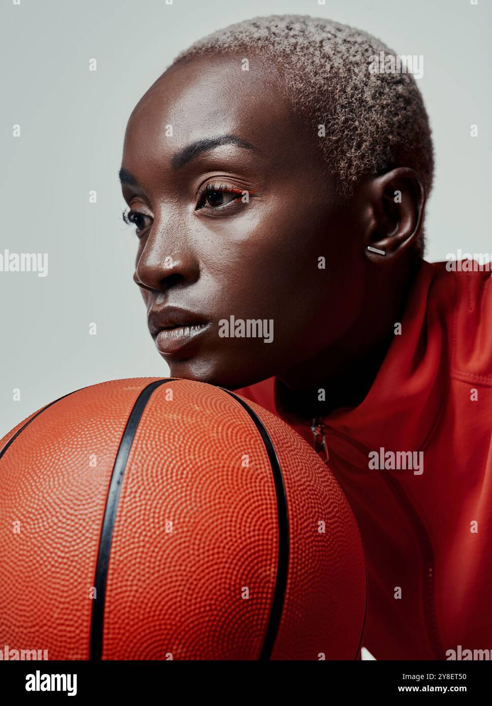 Studio, black woman and thinking with basketball for game, balance and ...