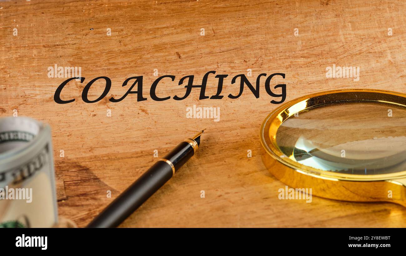 COACHING written on papyrus in a composition with a fountain pen, a ...