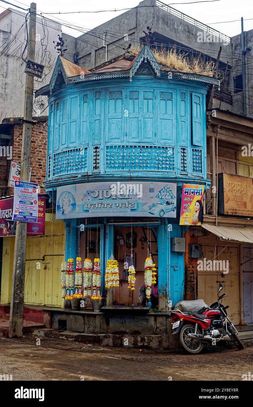 Beautiful wooden corner house with flower shop at Mahatma Gandhi Marg ...