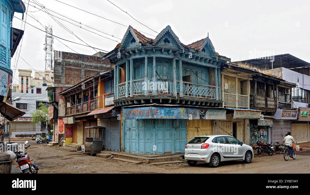 Beautiful old wooden corner house with shops at Mahatma Gandhi Marg ...