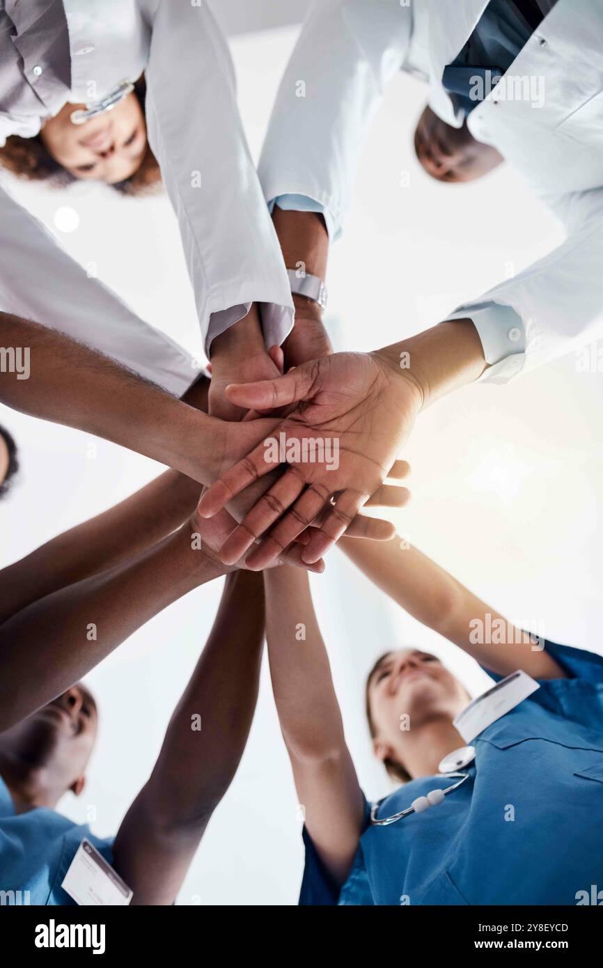 Medical, team and hands together with support in hospital for ...