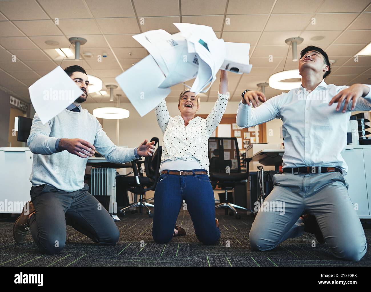 Throwing, paperwork and celebration of group, office and excited with ...