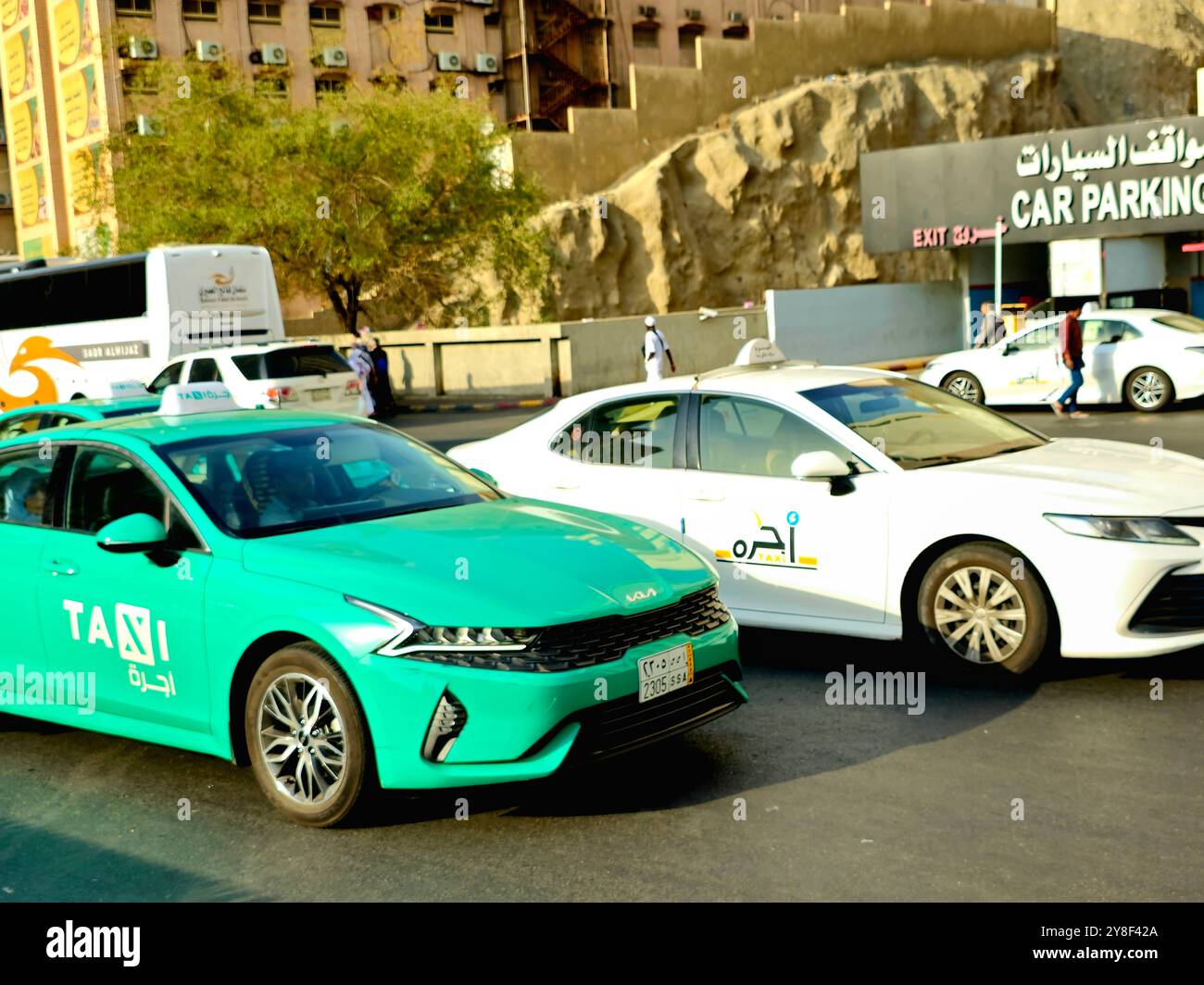 Mecca, Saudi Arabia, June 6 2024: Mecca Makkah Taxi, used to transport Hajj pilgrims inside and ...