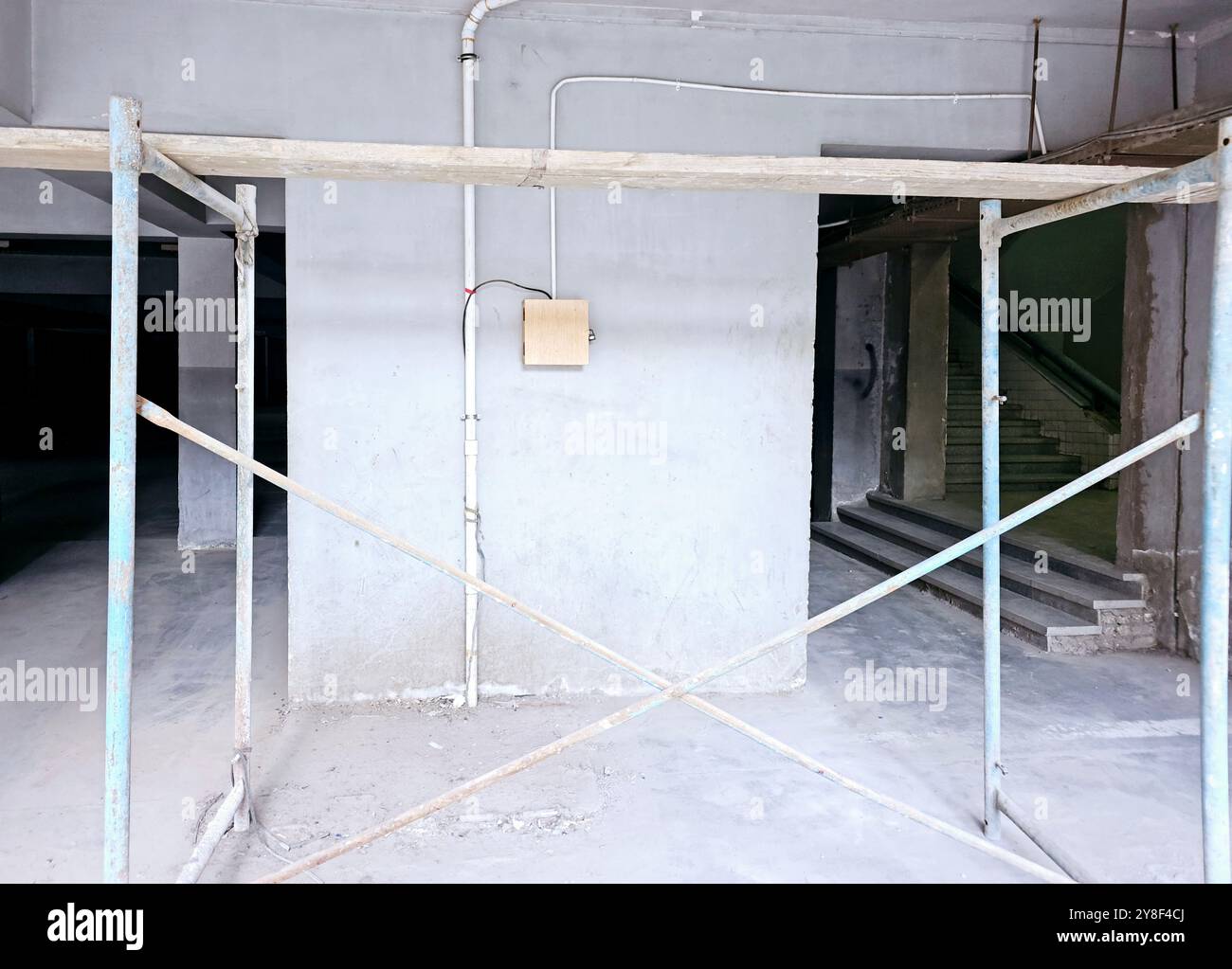 an assembled metal scaffold, a temporary structure constructed using ...