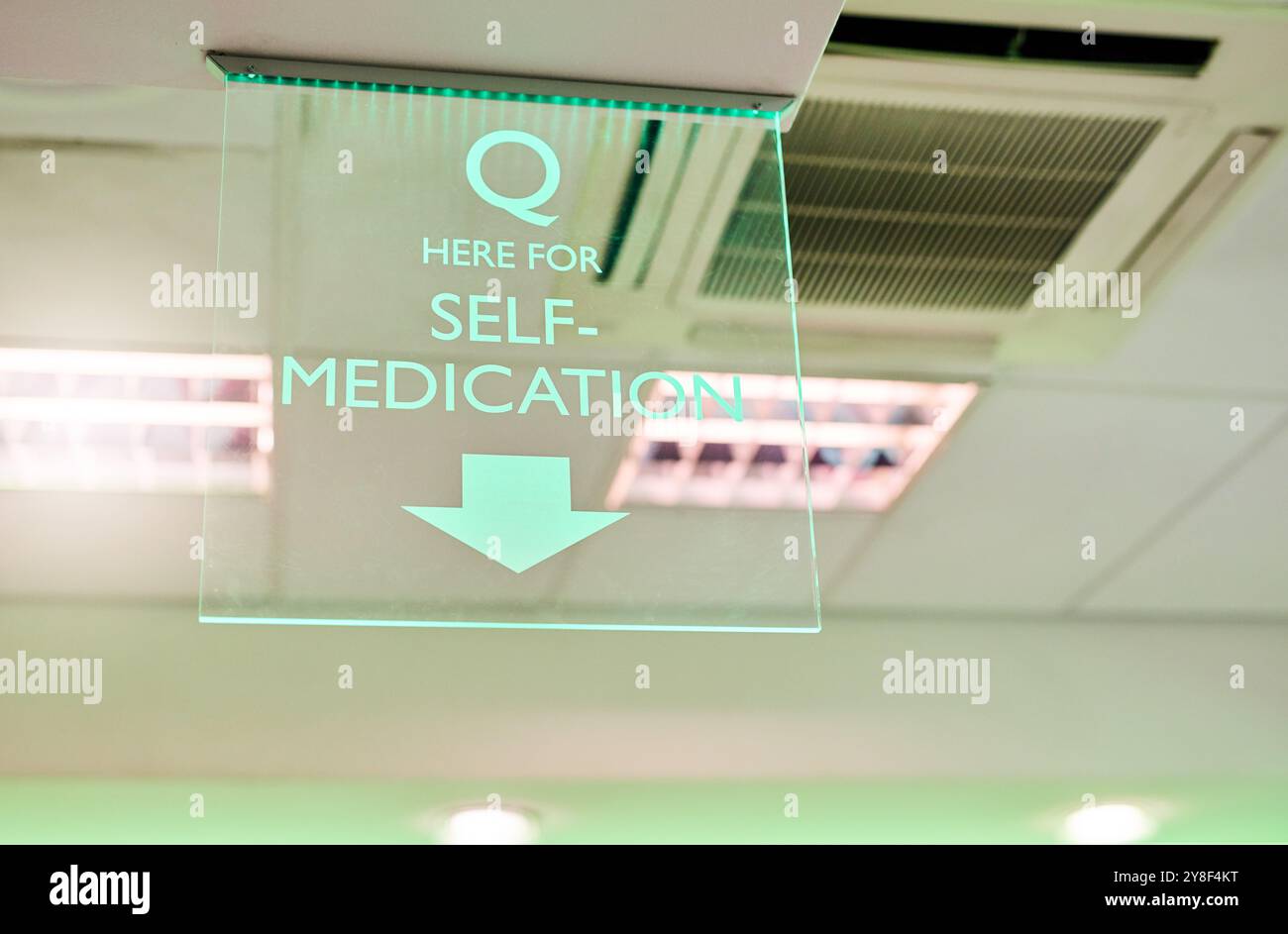 Pharmacy, direction and information with sign for medication, treatment ...