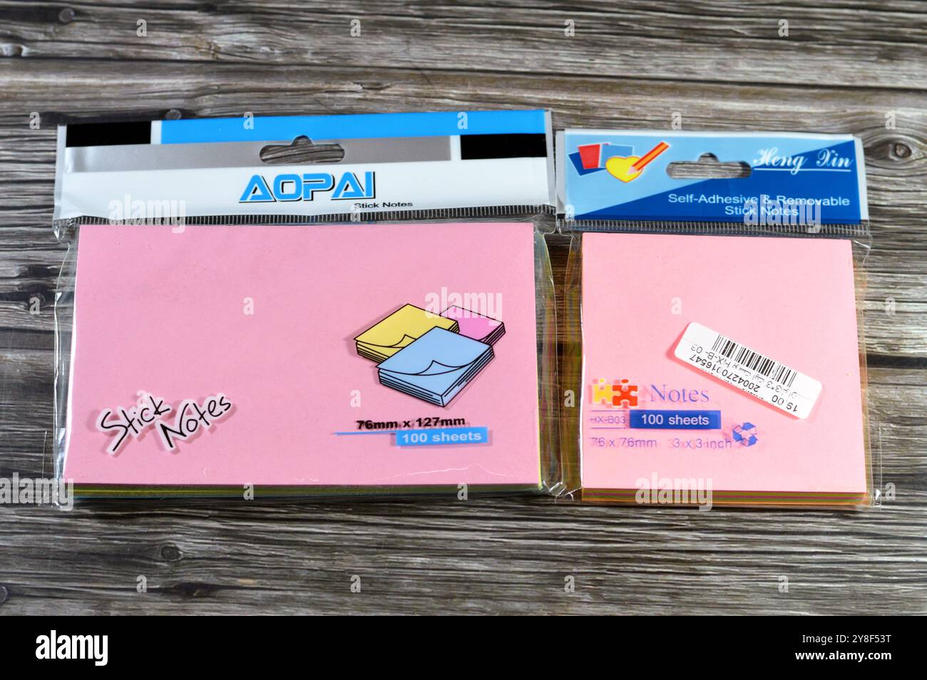 Cairo, Egypt, September 13 2024: sticky note or Post-it note Heng Nin and AOPAI, a small piece ...