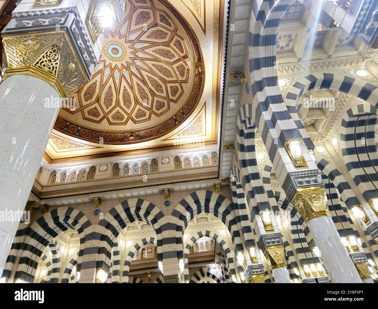 The interior of The Prophet's Mosque In Madinah or Al Masjid Al Nabawi ...