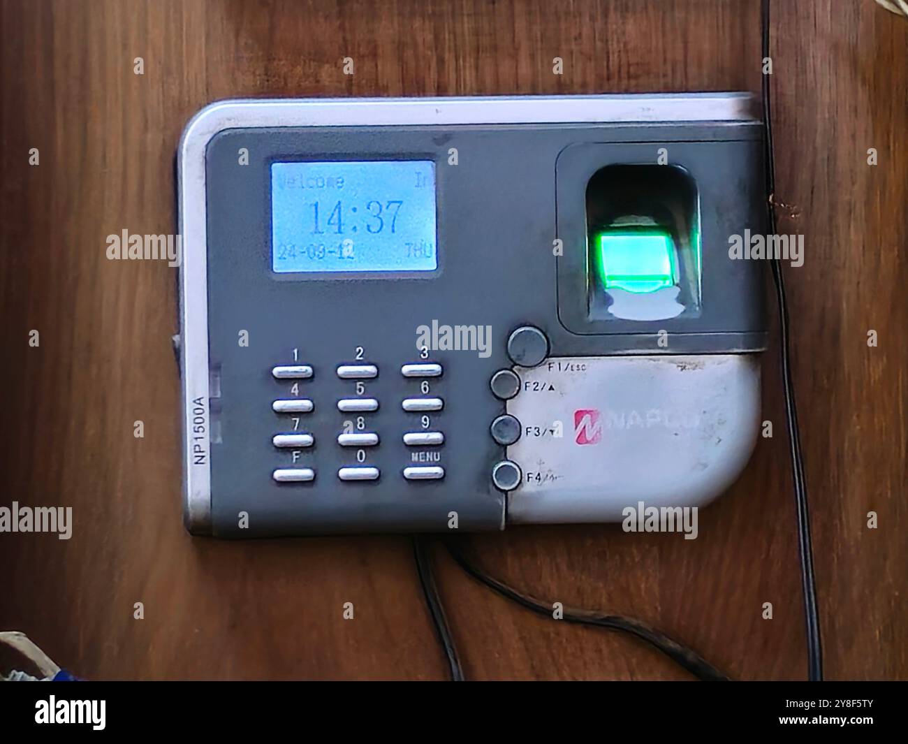 Cairo, Egypt, September 12 2024: Time attendance and departure device system with finger print ...