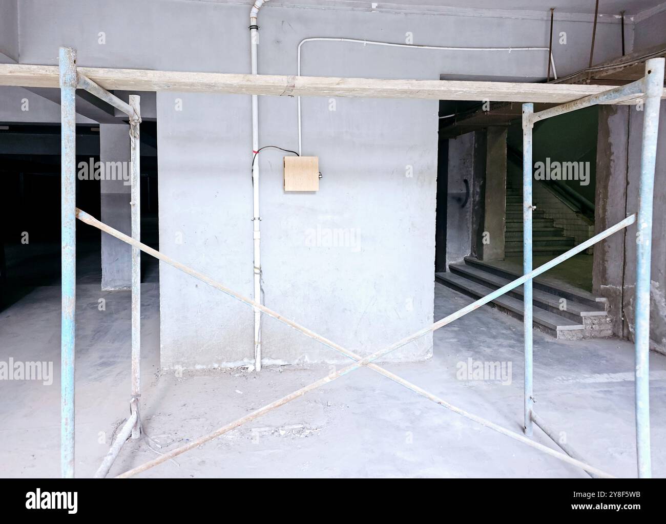 an assembled metal scaffold, a temporary structure constructed using ...