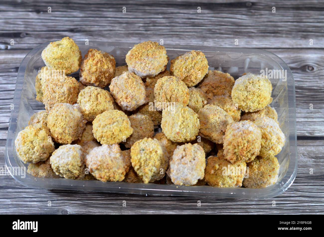 Frozen pre-fried Falafel, a deep-fried ball or patty-shaped fritter of ...