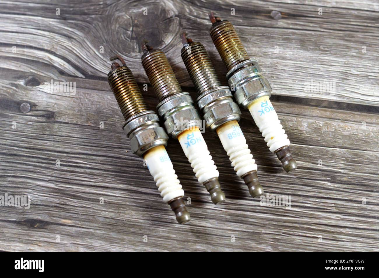 Cairo, Egypt, September 13 2024: Used spark plugs, a device that ...