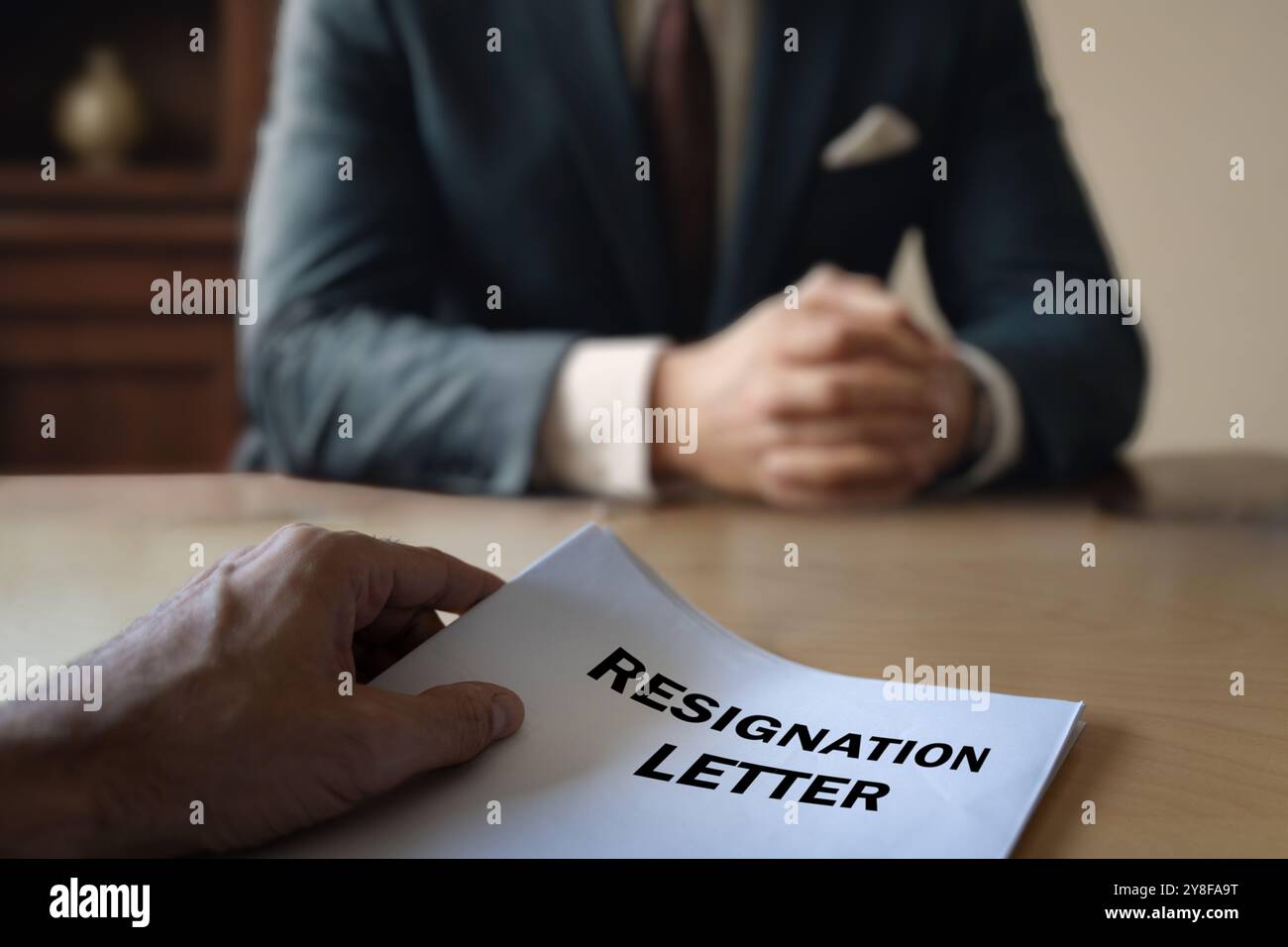 Businessman Receiving Resignation Letter Amidst The Great Resignation ...