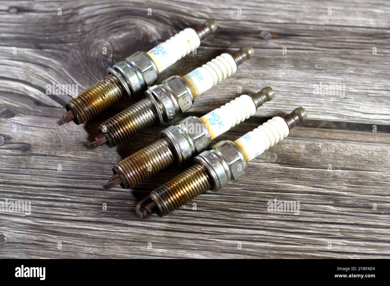 Cairo, Egypt, September 13 2024: Used spark plugs, a device that ...