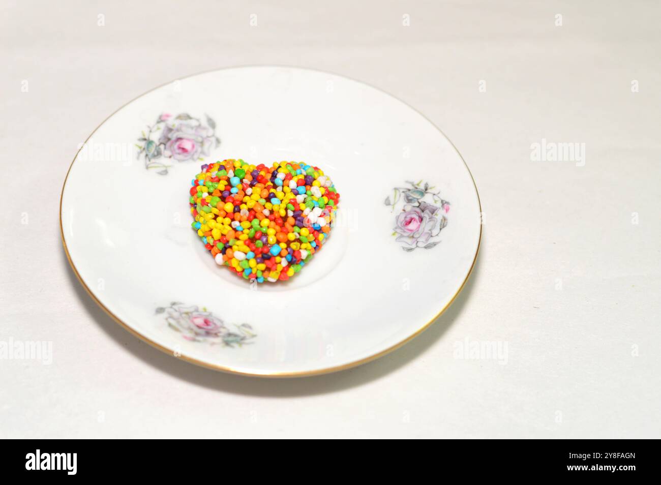 sweet taffy dessert coated with candy coated rainbow chips, a sweet ...