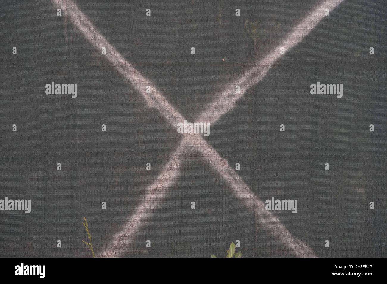 object in a cross shape or form, pattern and texture on a surface ...