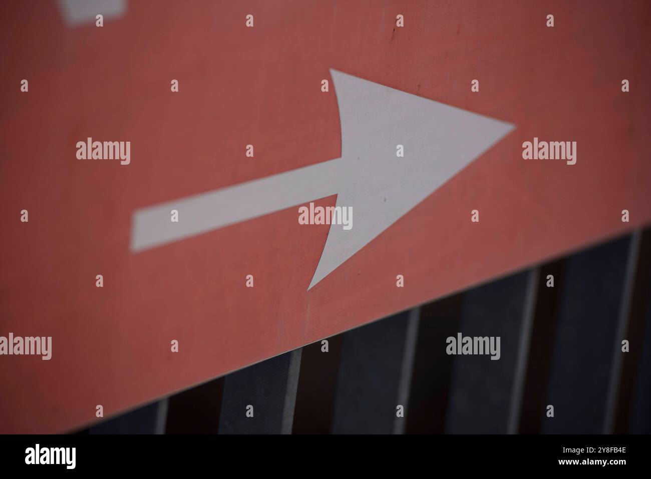 direction arrow points in one way, sign to move towards this direction ...