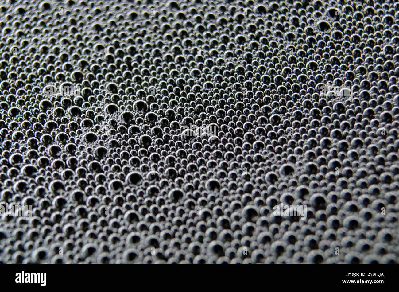 Top view of air bubbles trapped inside a gel-like transparent substance ...