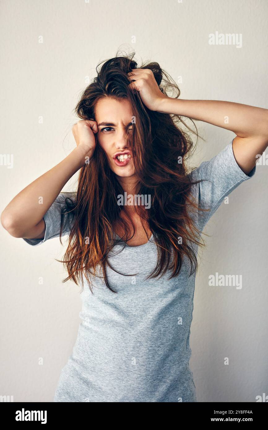 Frustrated, stress and portrait of woman with hair pulling, anger and ...