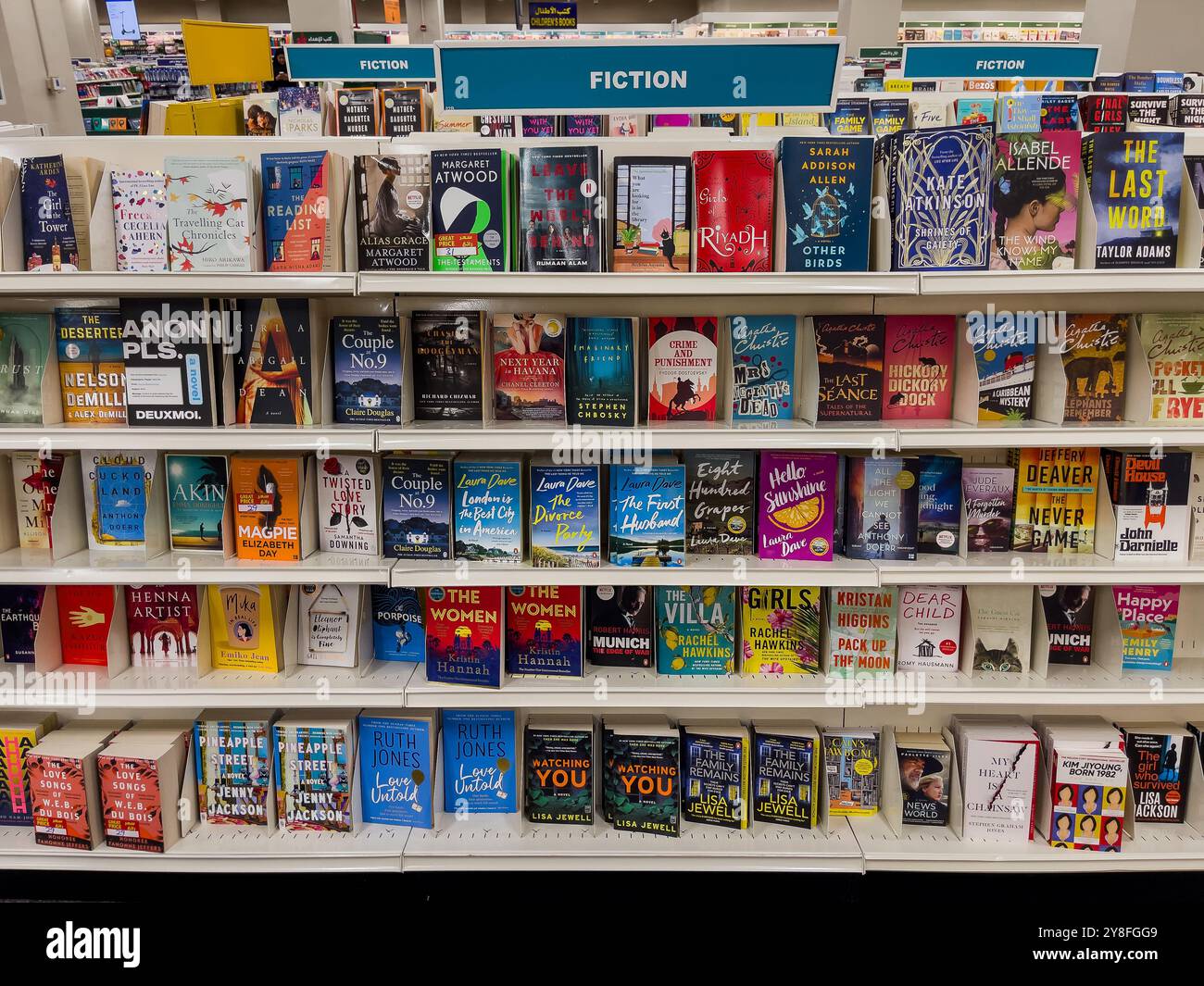 Bookshelf with various books in row at book store. Doha, Qatar OCT 05 ...