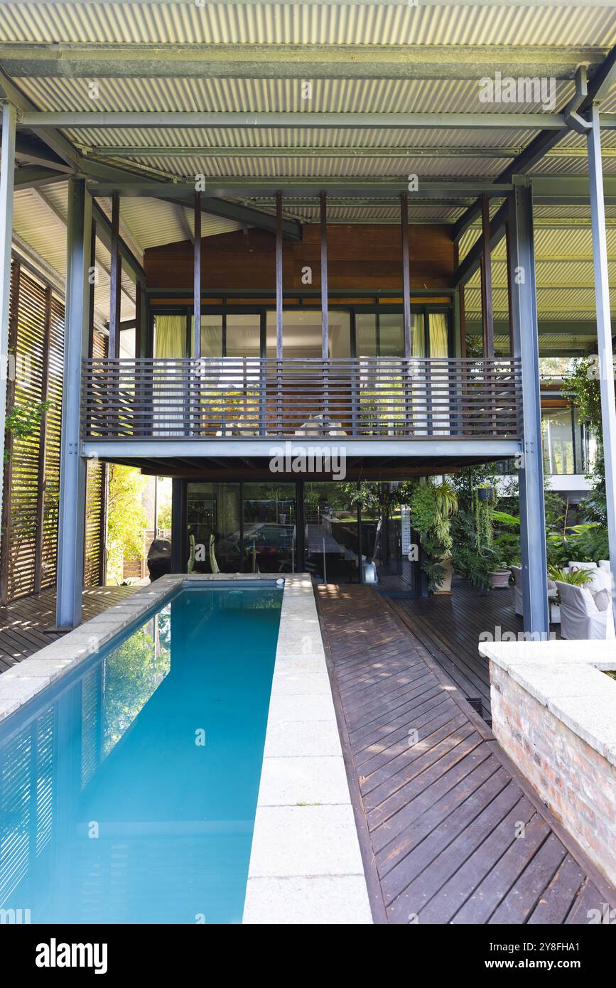 Modern big empty house with cosy terrace with couch and pool in big ...