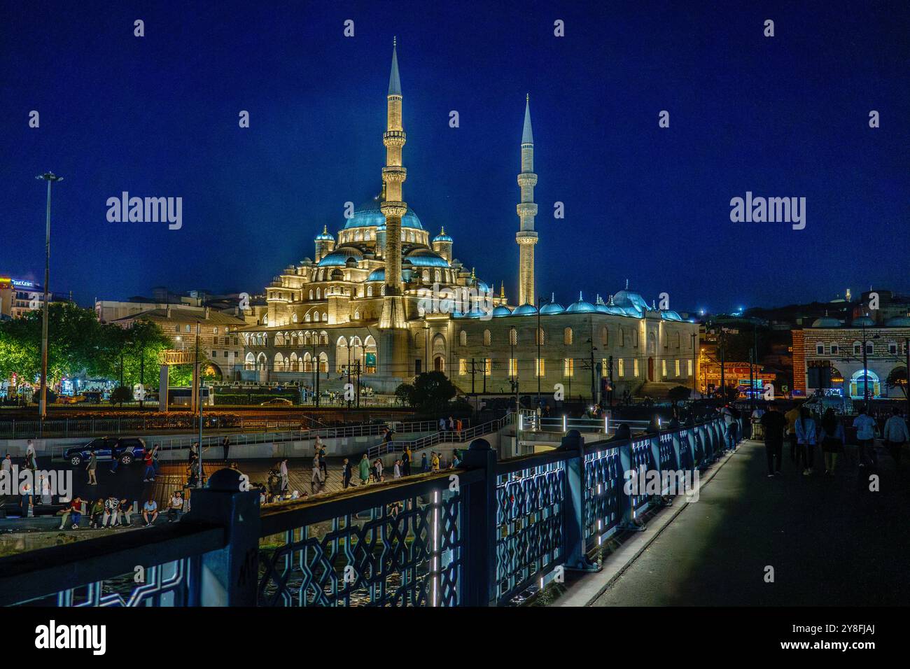 Turkiye. Istanbul. A night view of the Yeni Cami Mosque from the Galata ...