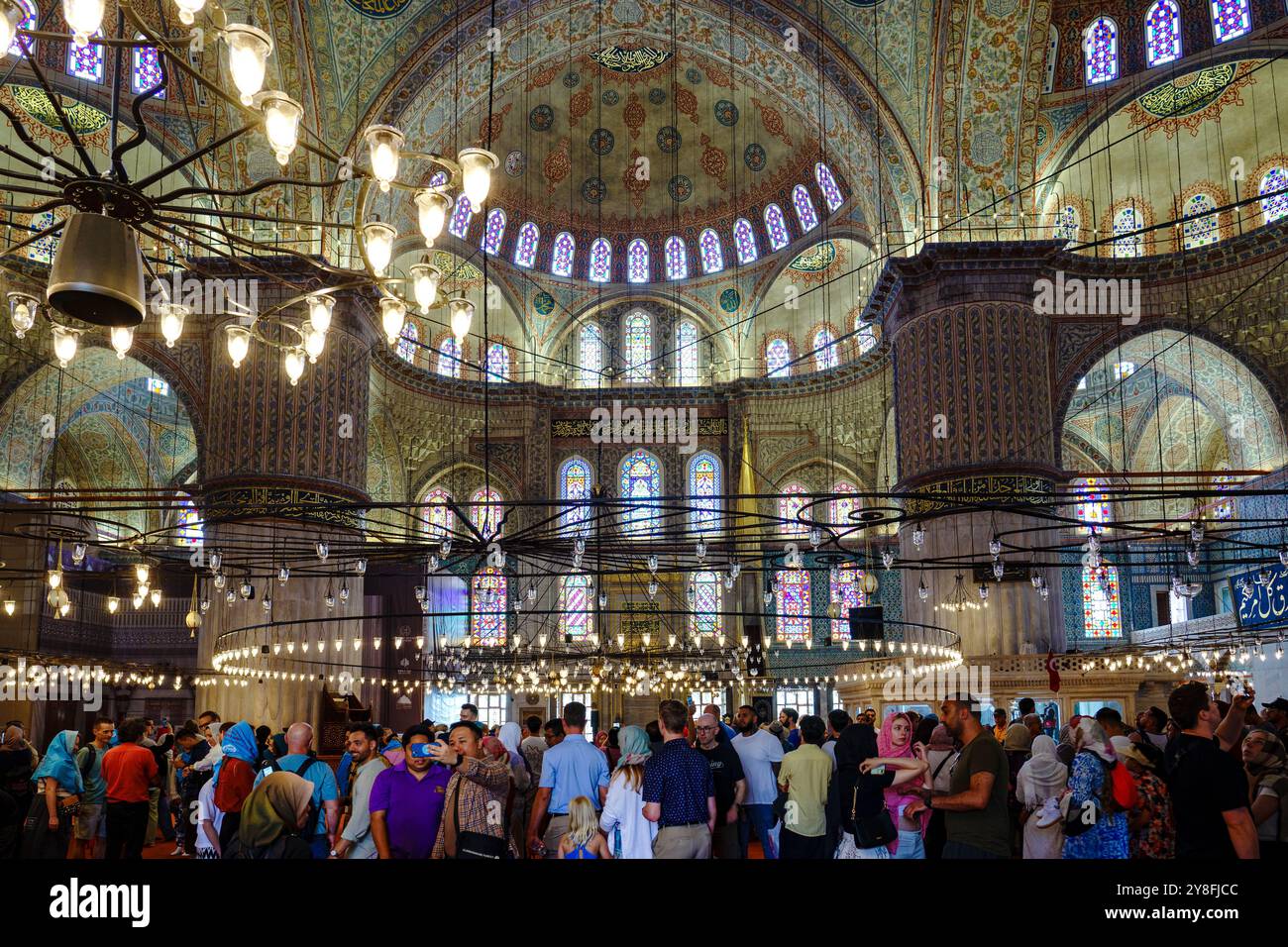 Türkiye. Istanbul. The interior of the Sultanahmed mosque filled with a ...