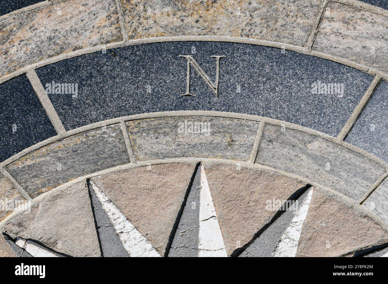 View from above of a stone pavement decorated with a compass rose ...