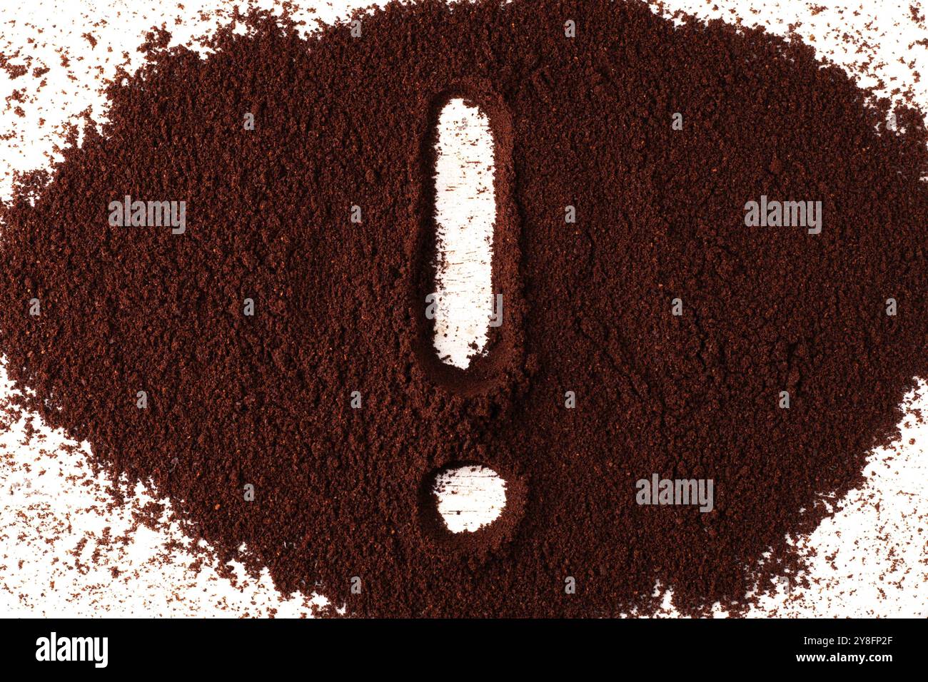 exclamation mark symbol, painted in brown coffee powder Stock Photo - Alamy