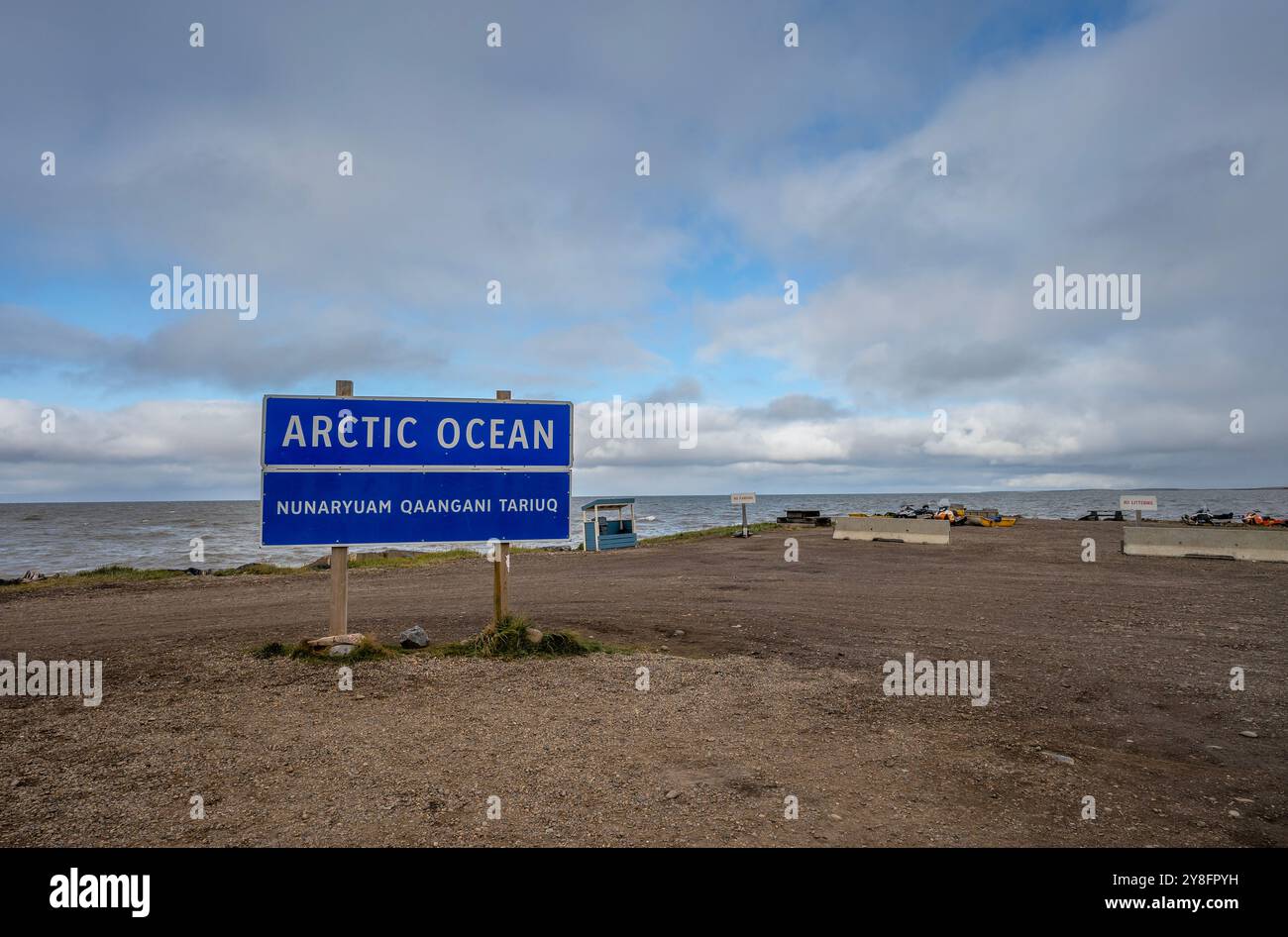 Sign marking the Arctic Ocean at Tuktoyaktuk, Northwest Territories ...