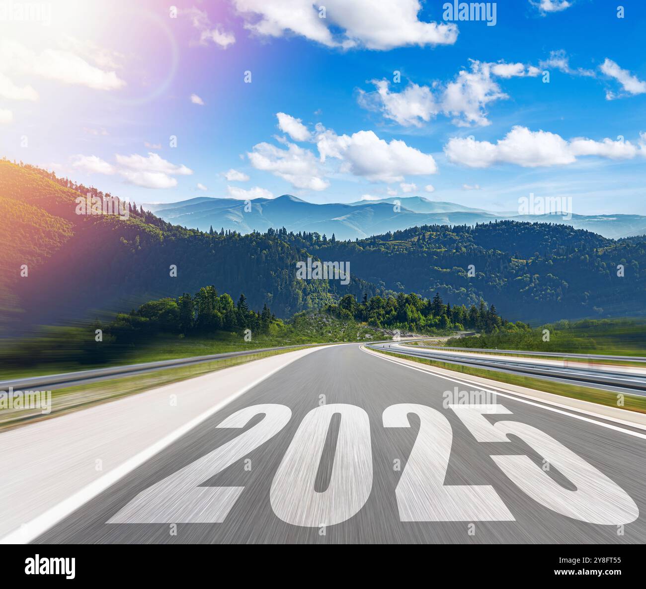 Asphalt road with the number 2025 New Year Stock Photo - Alamy