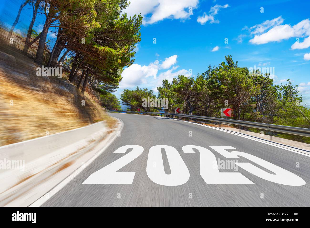 Asphalt road with the number 2025 New Year Stock Photo - Alamy