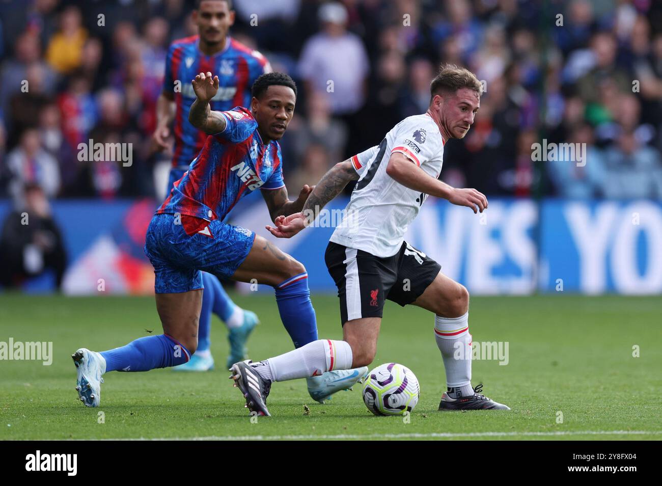Crystal Palace's Nathaniel Clyne, left, and Liverpool's Alexis Mac ...