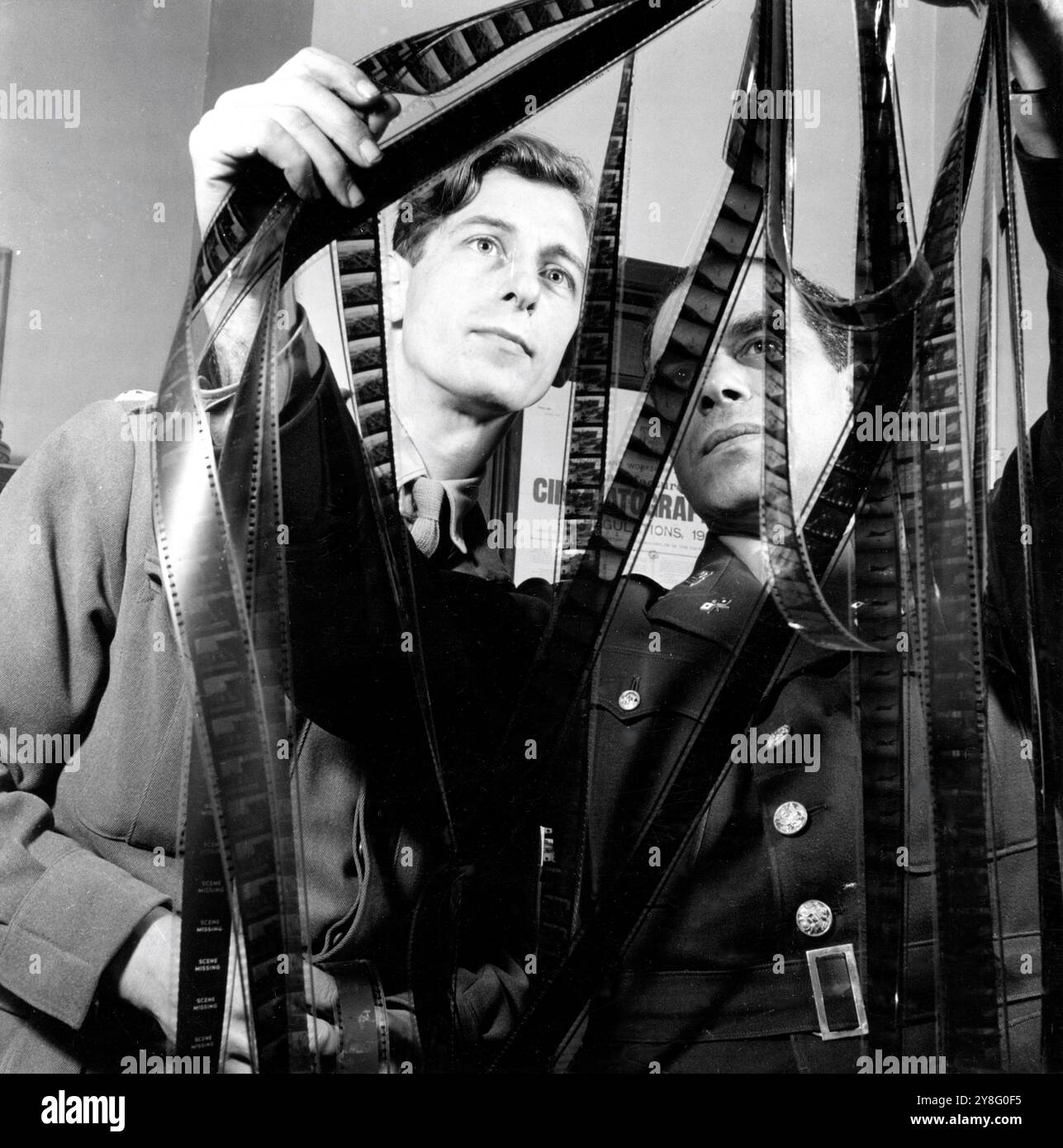 Captain ROY BOULTING of the Army Film Unit and Lieutenant Colonel FRANK ...