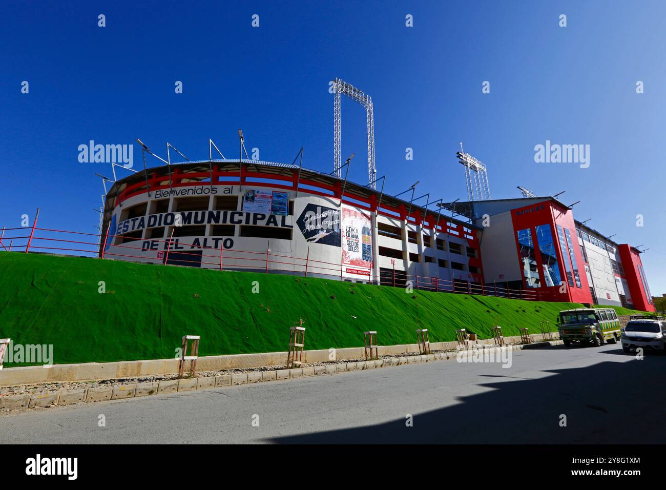 Vintage green micro bus passing Estadio Municipal football stadium ...