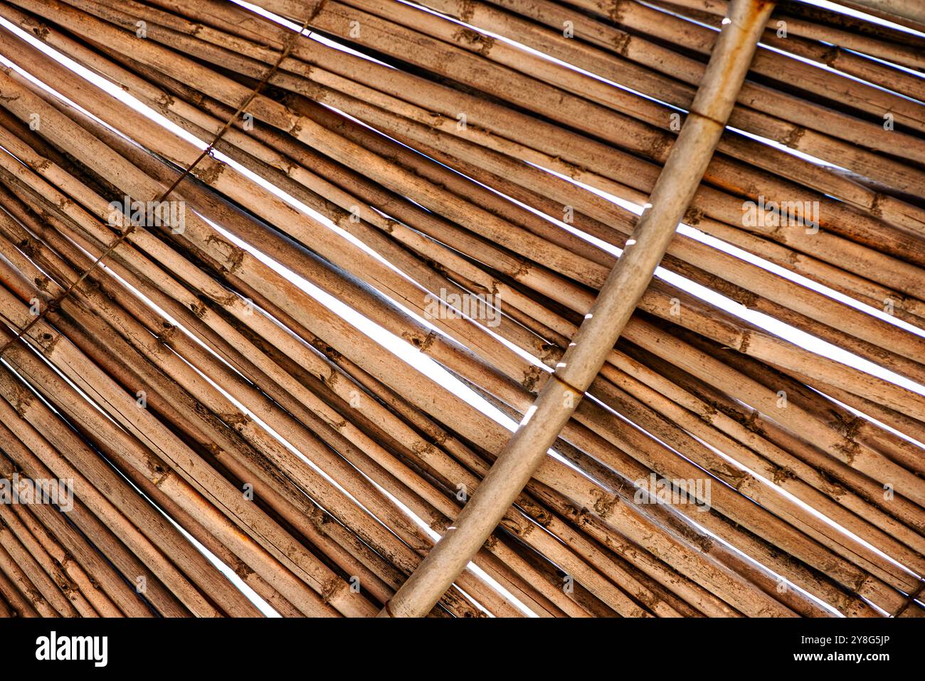 Setting sun straw umbrella hi-res stock photography and images - Alamy