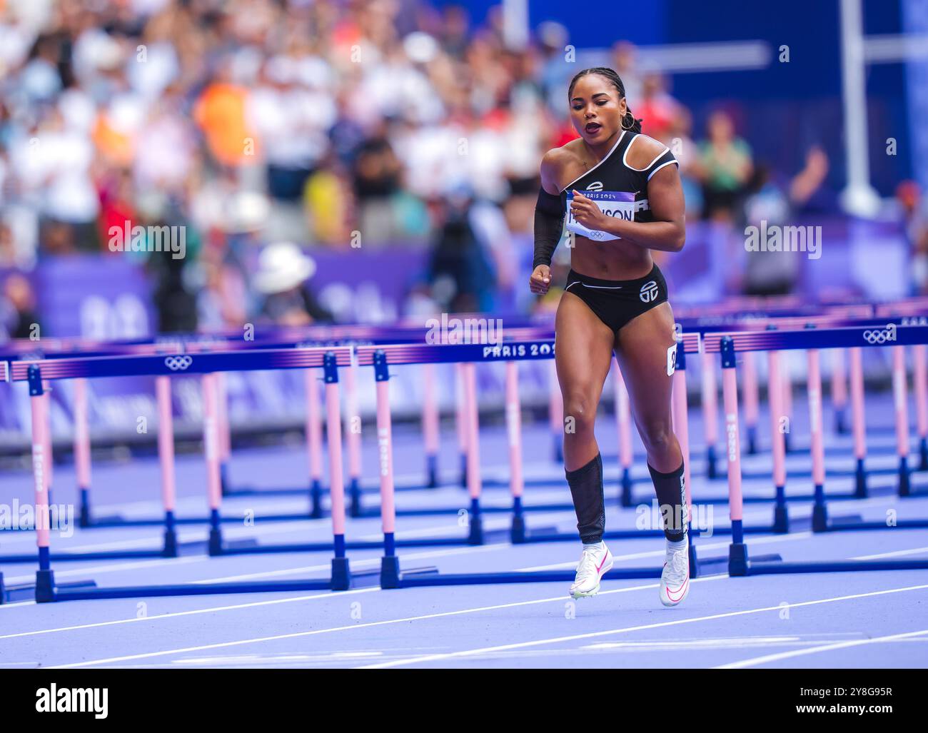 Ebony Morrison participating in the 100 meters hurdles at the Paris 2024 Olympic Games Stock ...