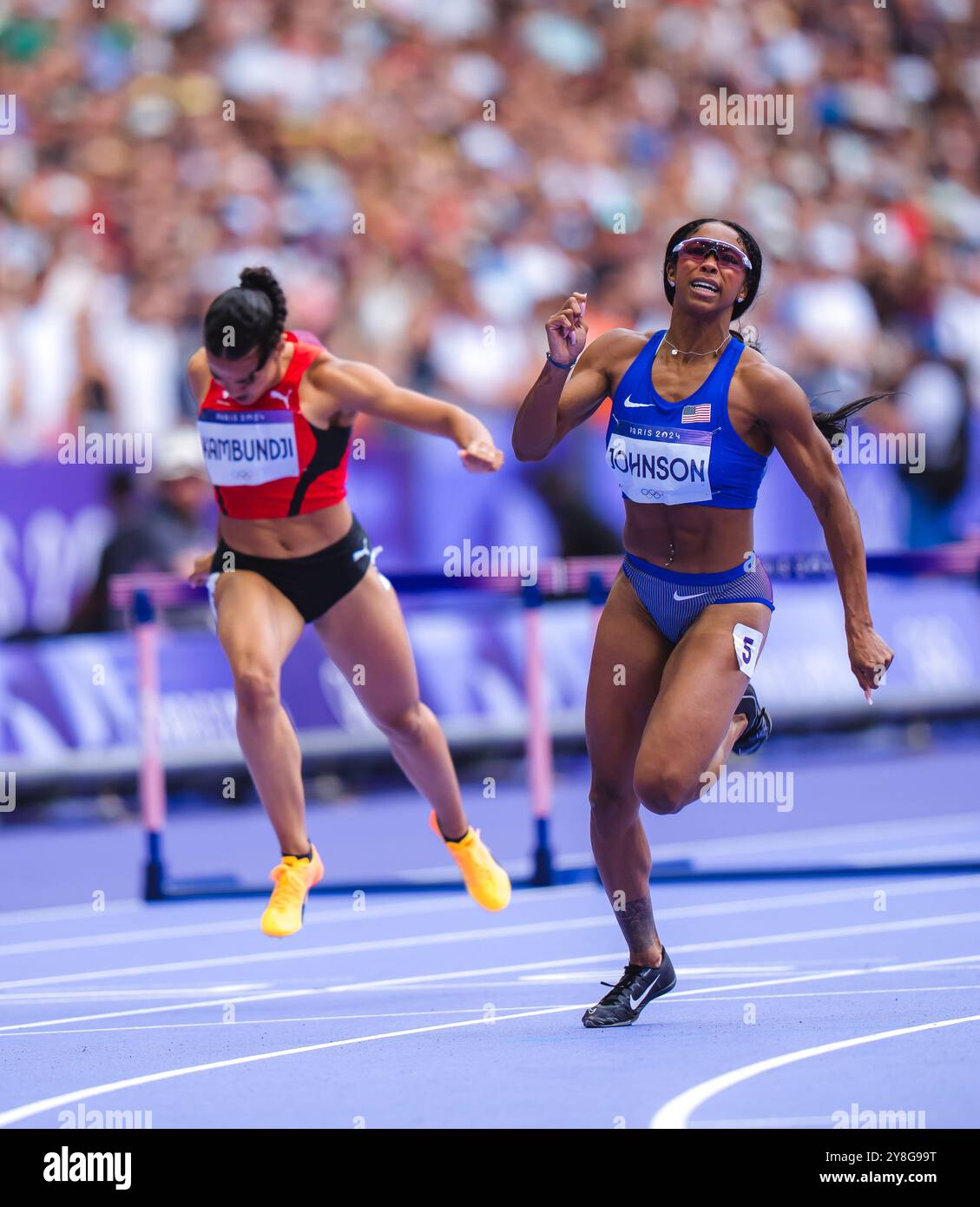 Alaysha Johnson participating in the 100 meters hurdles at the Paris ...