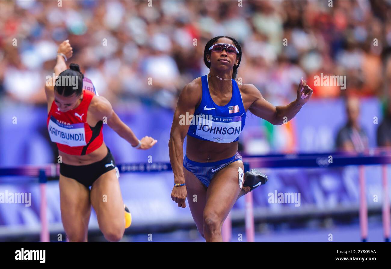 Alaysha Johnson participating in the 100 meters hurdles at the Paris ...