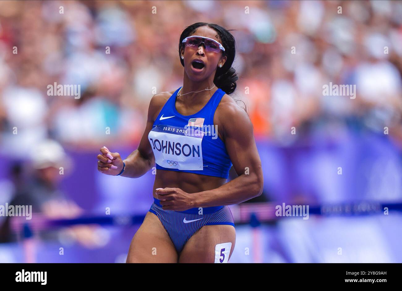 Alaysha Johnson participating in the 100 meters hurdles at the Paris ...