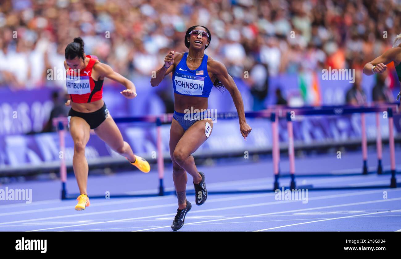 Alaysha Johnson participating in the 100 meters hurdles at the Paris ...