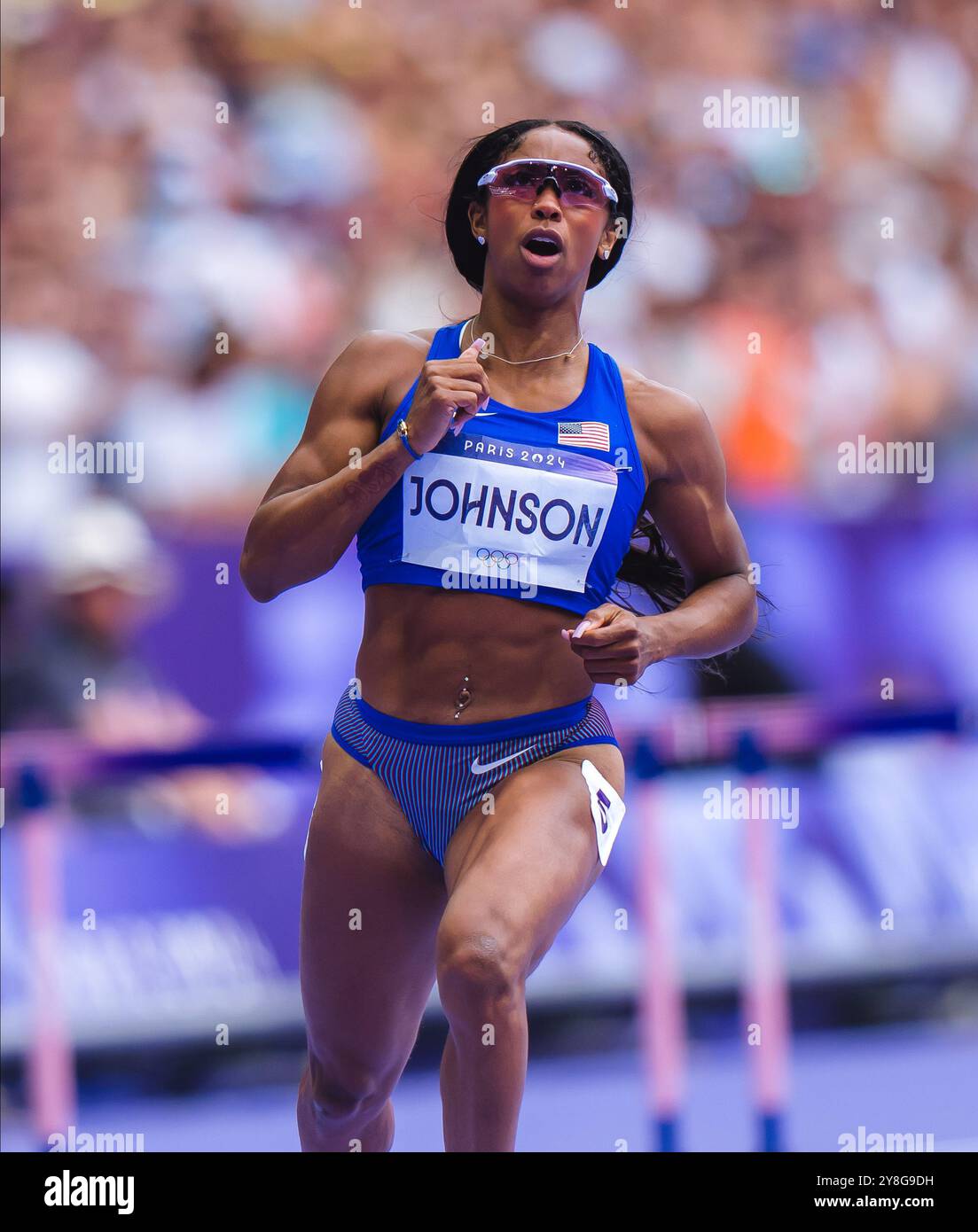 Alaysha Johnson participating in the 100 meters hurdles at the Paris ...
