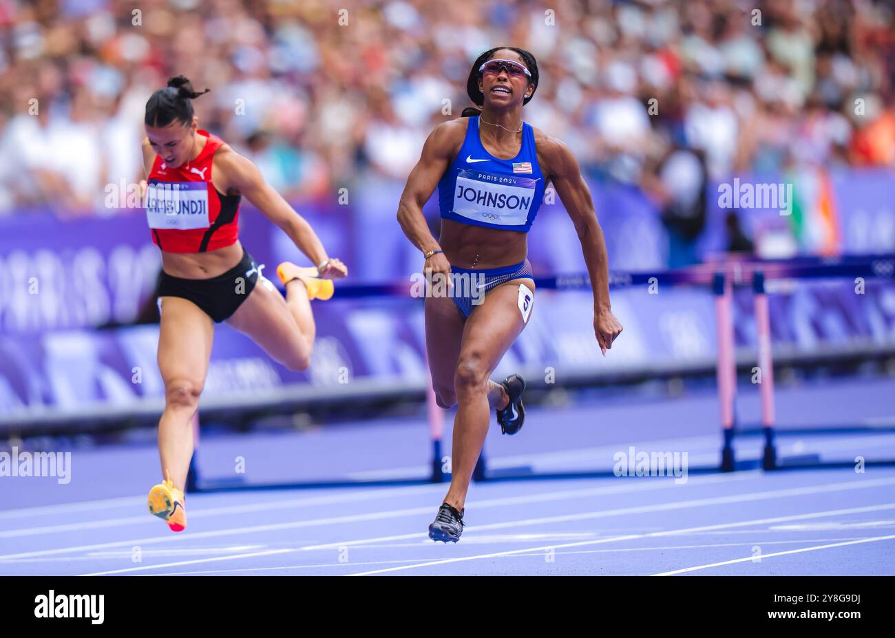 Alaysha Johnson participating in the 100 meters hurdles at the Paris ...