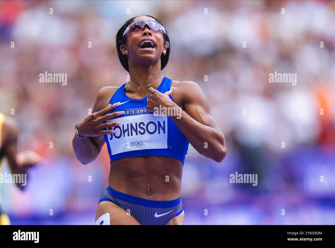 Alaysha Johnson participating in the 100 meters hurdles at the Paris ...