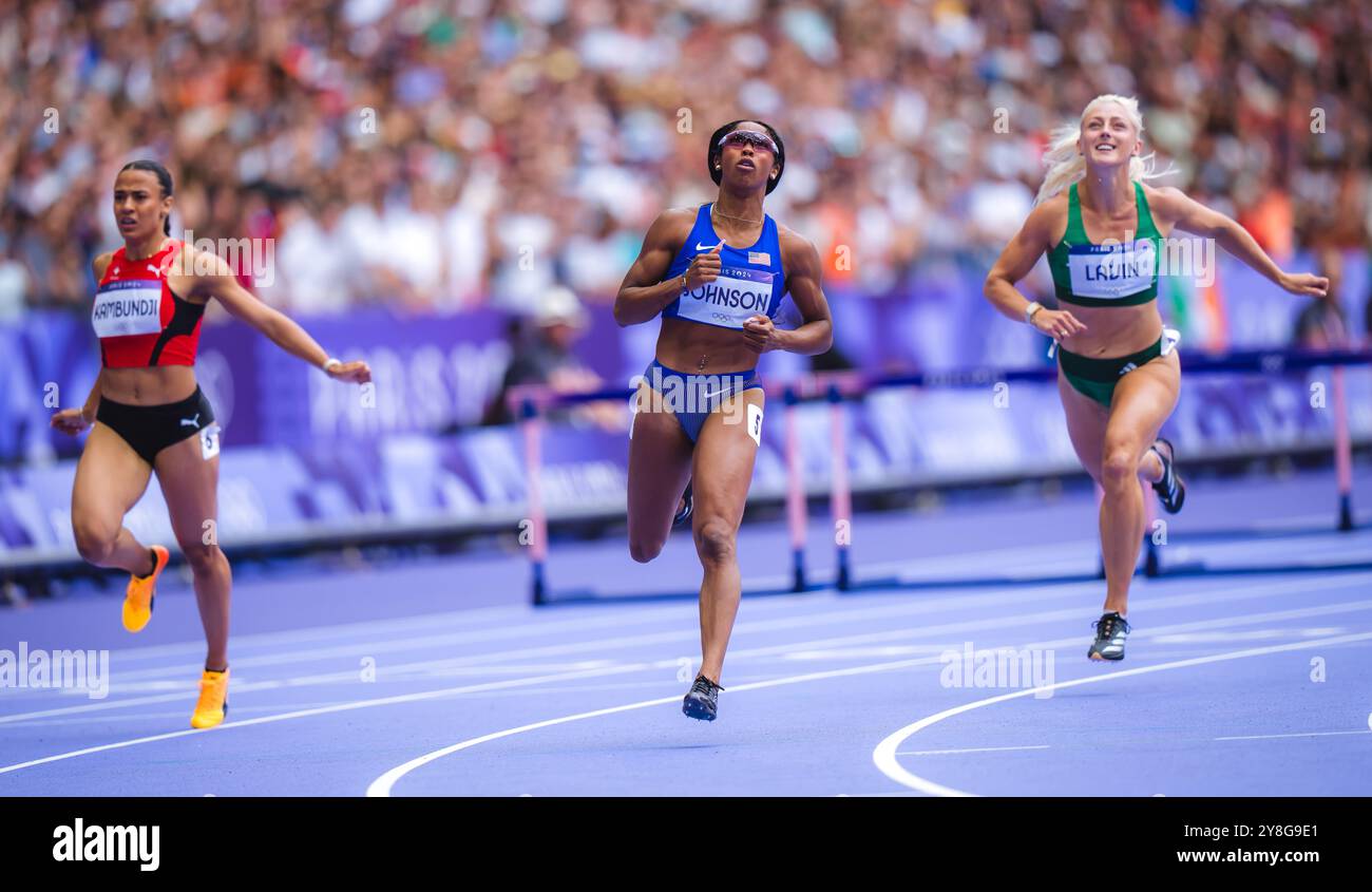 Alaysha Johnson participating in the 100 meters hurdles at the Paris ...