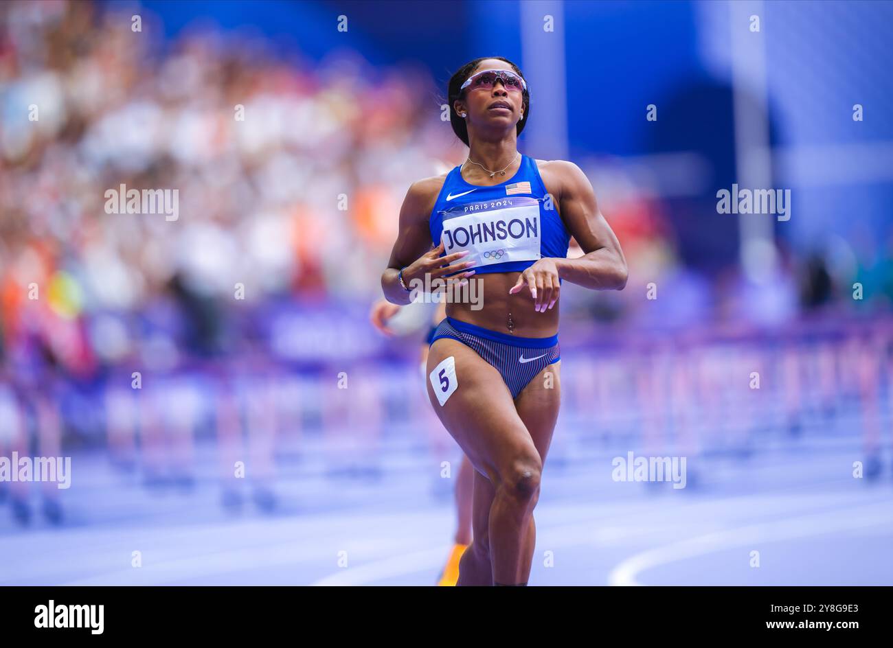 Alaysha Johnson participating in the 100 meters hurdles at the Paris ...